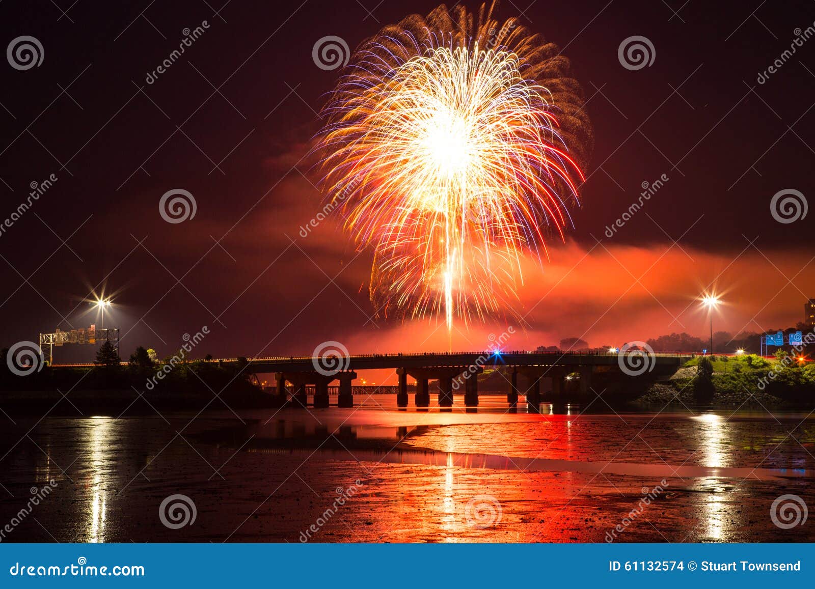 Fireworks and Lights Over the Bridge Stock Photo - Image of reflection ...