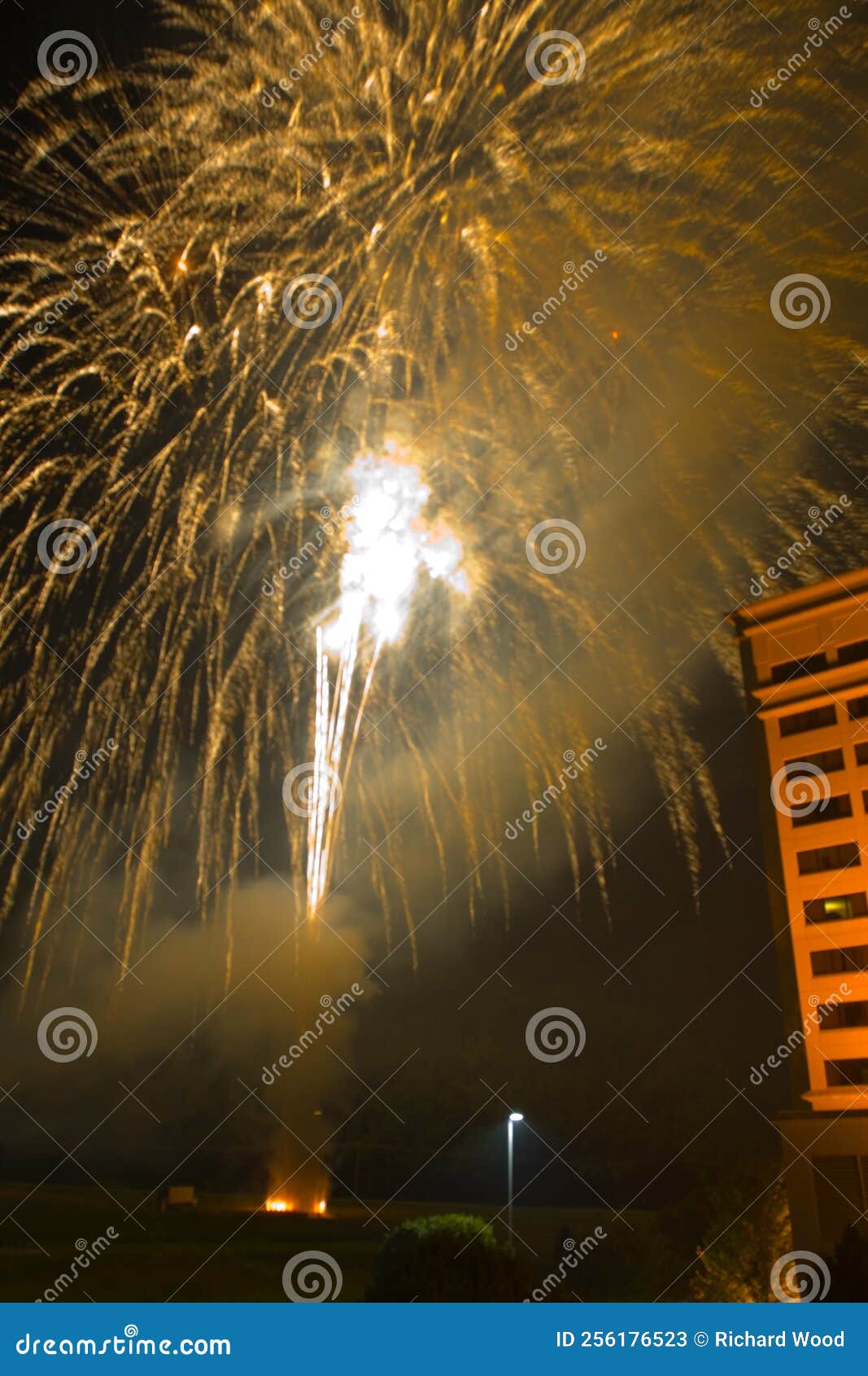View of Fireworks Next To a Tall Building Stock Image - Image of tall ...