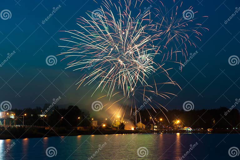 Fireworks at Night Over Water Stock Photo - Image of time, long: 57109646