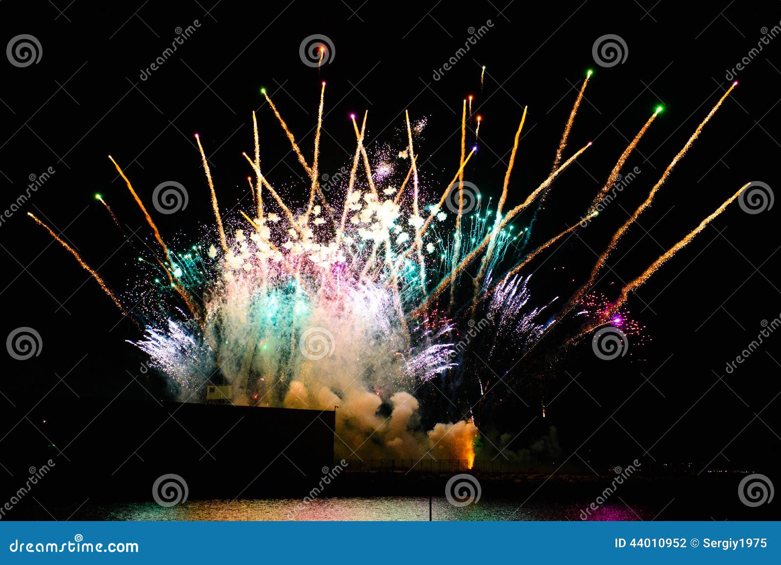 Fireworks in the night sky stock photo. Image of fire - 44010952