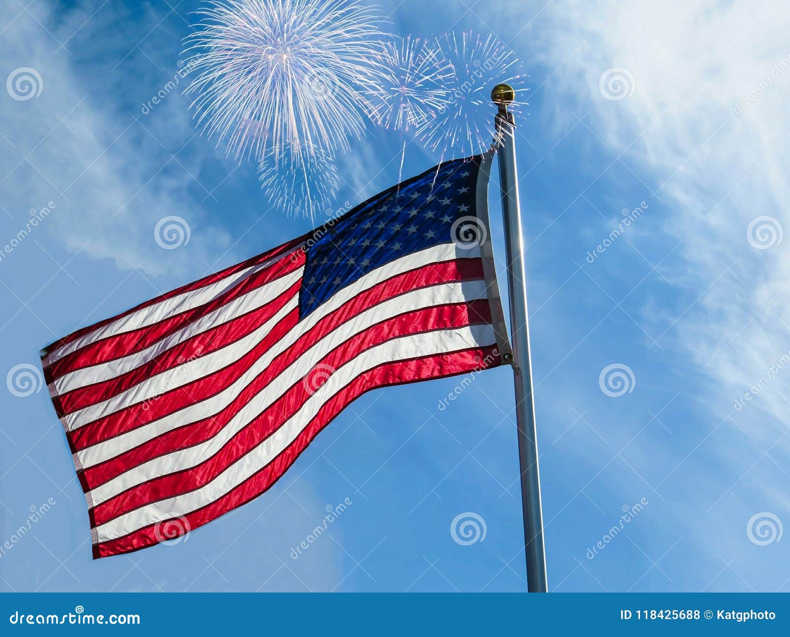 Fireworks Over an American Flag in the Cloudy Sky Stock Photo - Image ... Fireworks Over an American Flag in the Cloudy Sky Stock Photo - Image ...