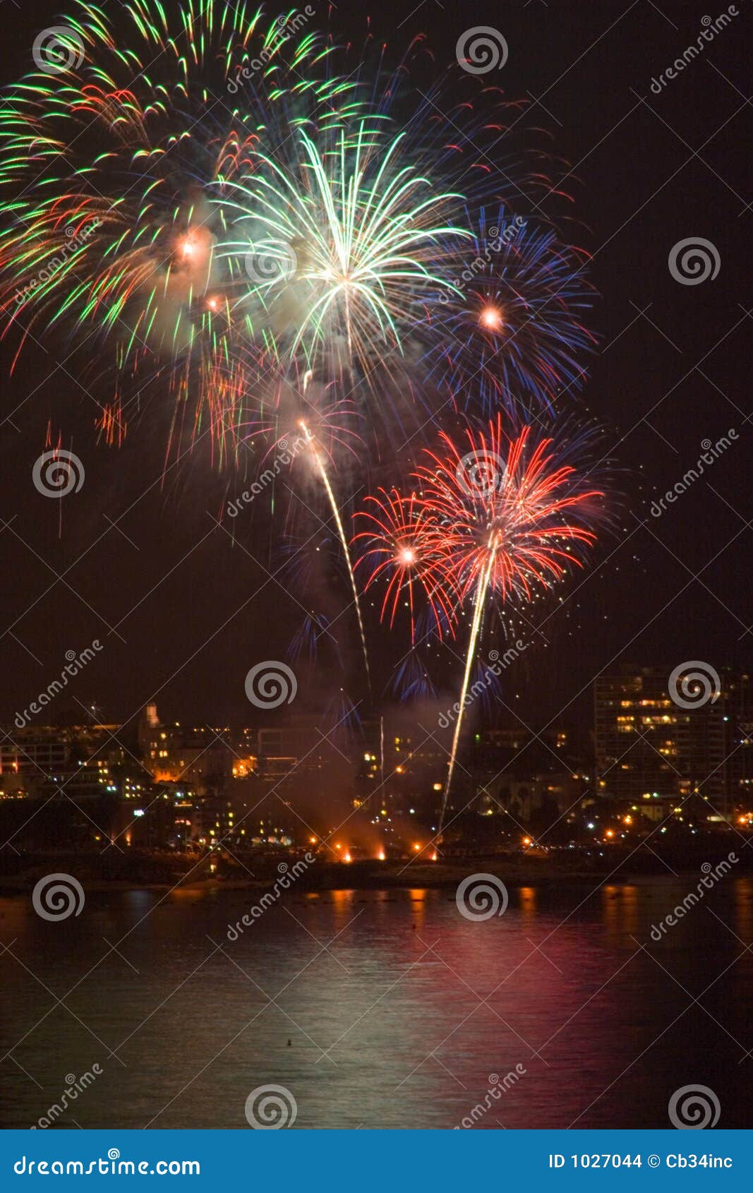 Fireworks over water stock photo. Image of fireworks, patriotism - 1027044
