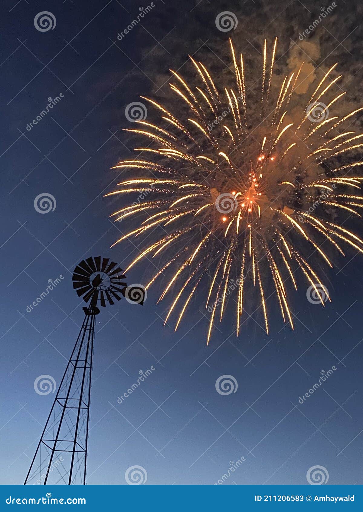 Fireworks over a windmill. stock image. Image of fourth - 211206583