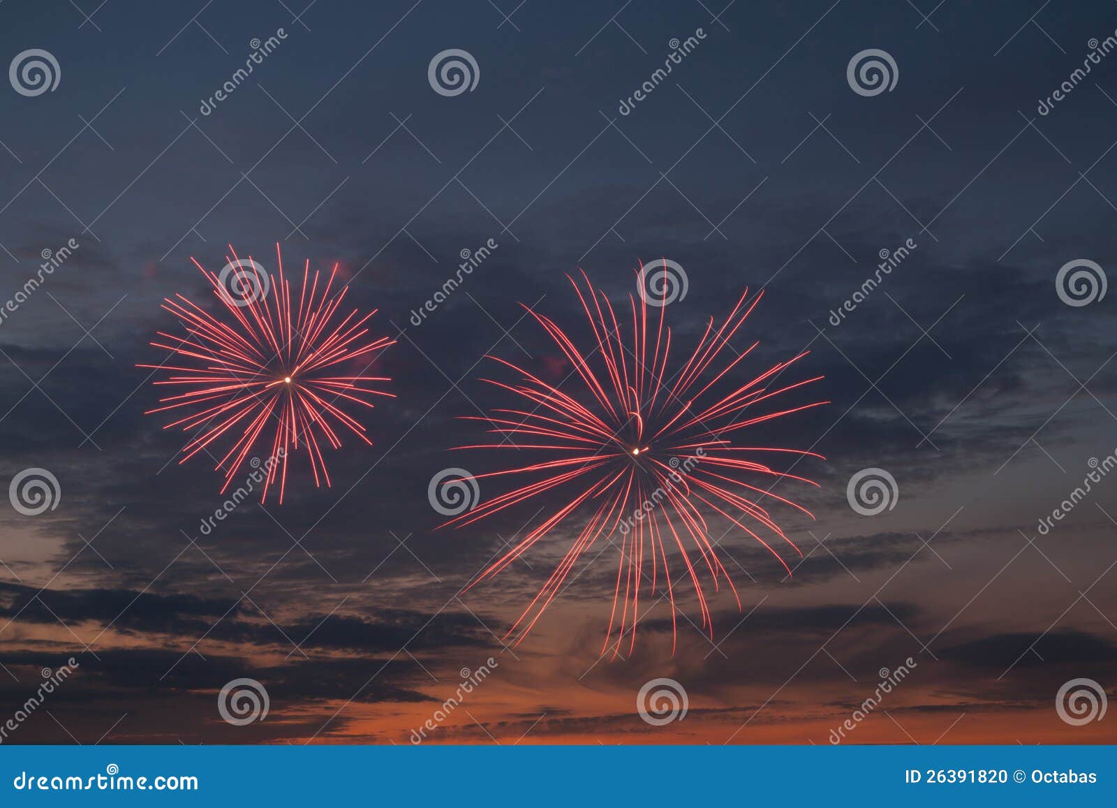 Fireworks at sunset stock photo. Image of light, sunset - 26391820
