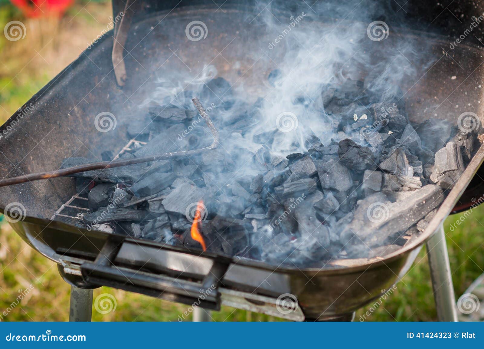 Firing up the grill stock image. Image of flame, outdoor - 41424323