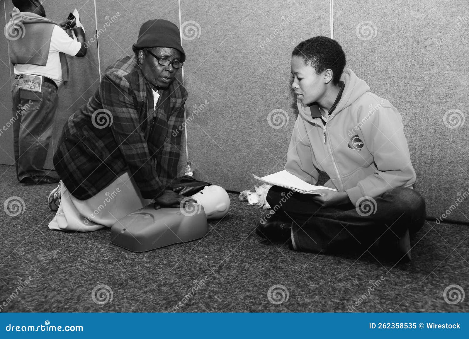 First Aid CPR Training with a Plastic Dummy in Grayscale Editorial ...