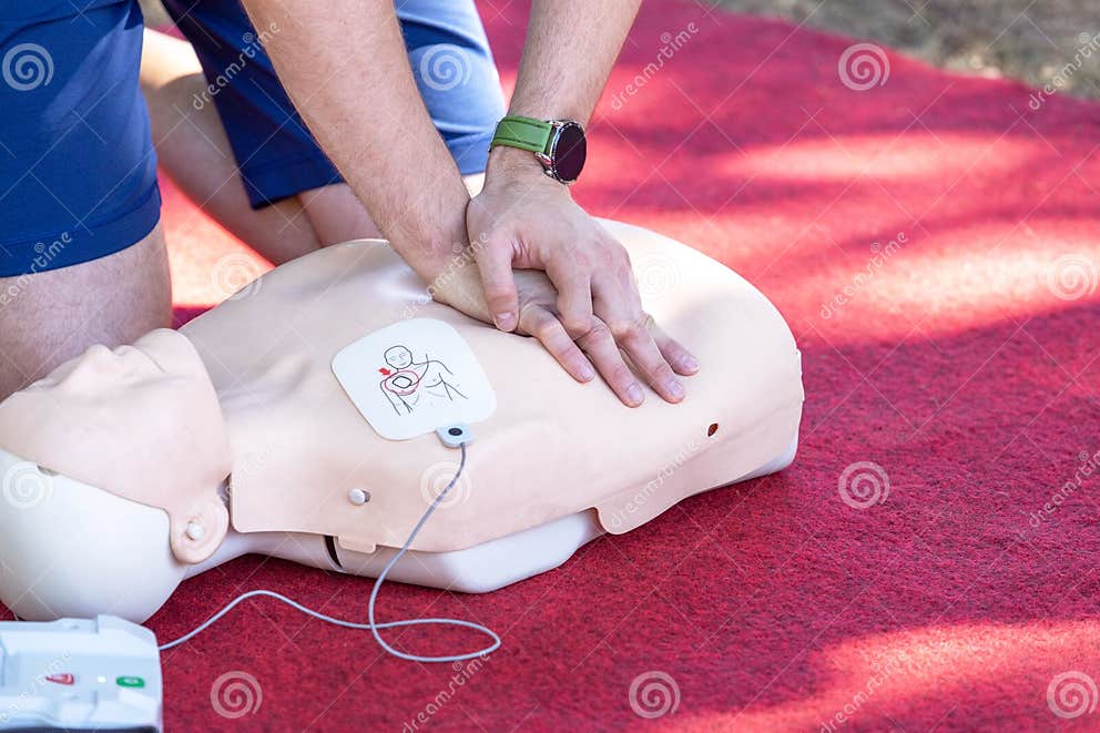 AED - Automated External Defibrillation during CPR and First Aid Certification Course Stock ...