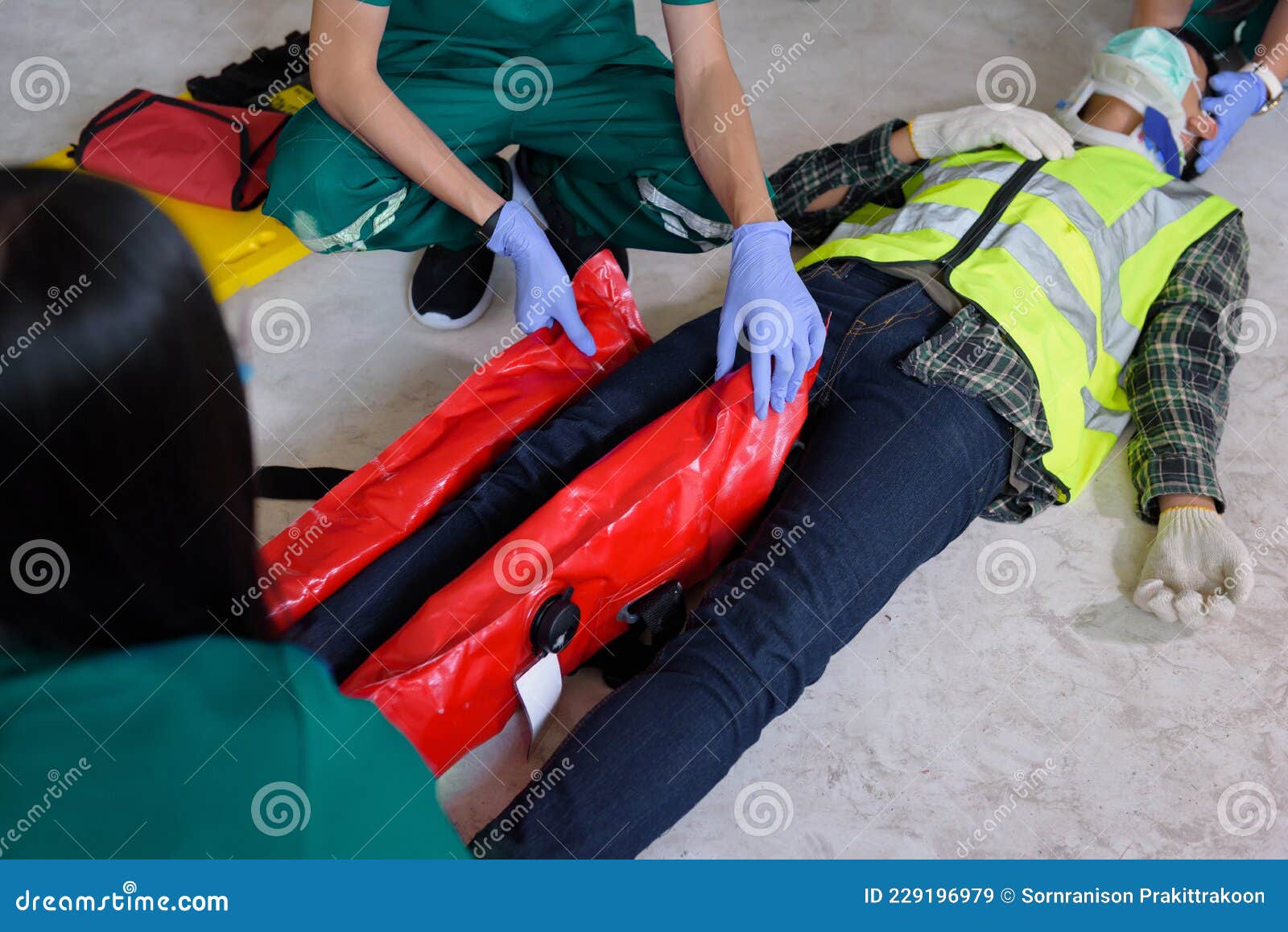 Accident in Industrial Work with First Aid Stock Image - Image of ...