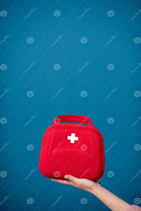 First Aid Kit on the Blue Background Stock Photo - Image of medical ...