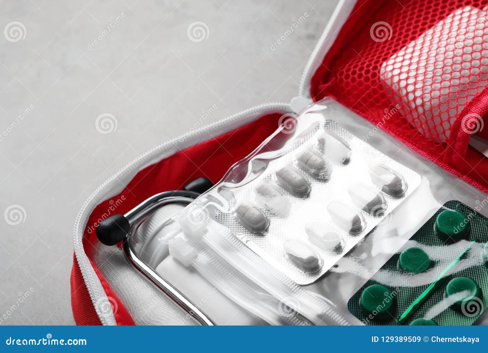 First Aid Kit on Gray Table Stock Image - Image of pills, pharmacy ...