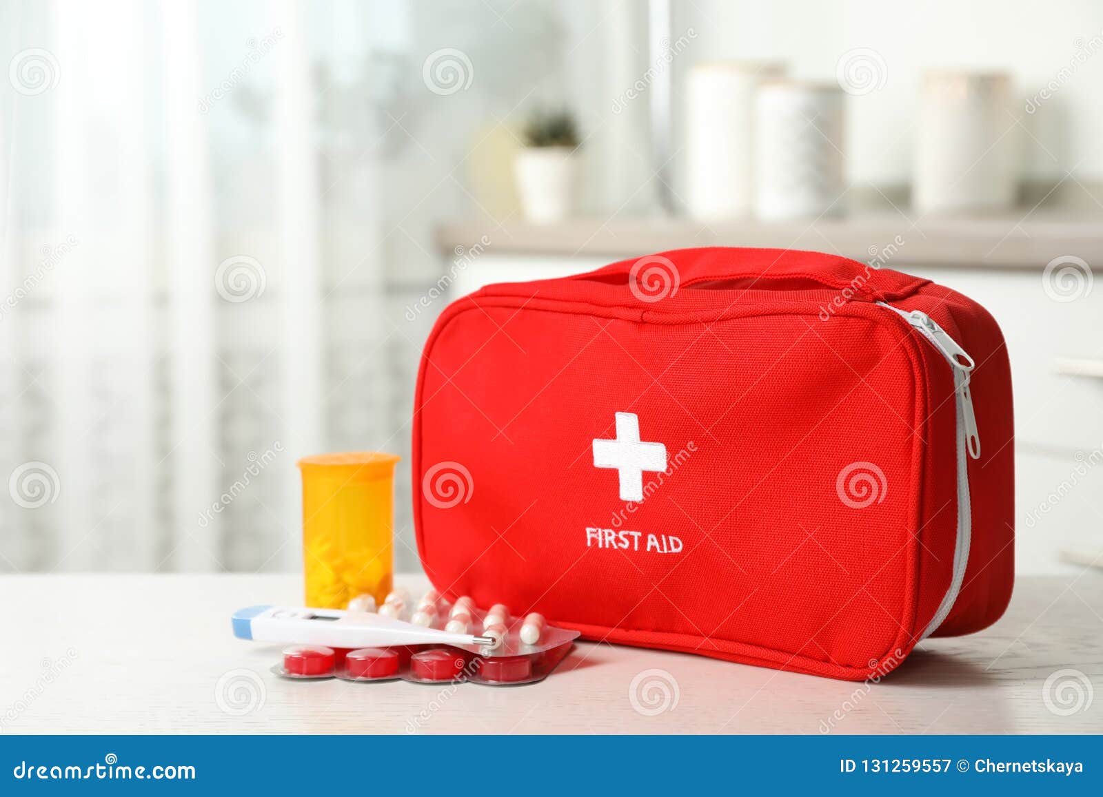 First Aid Kit with Pills on Table Indoors Stock Image - Image of home ...