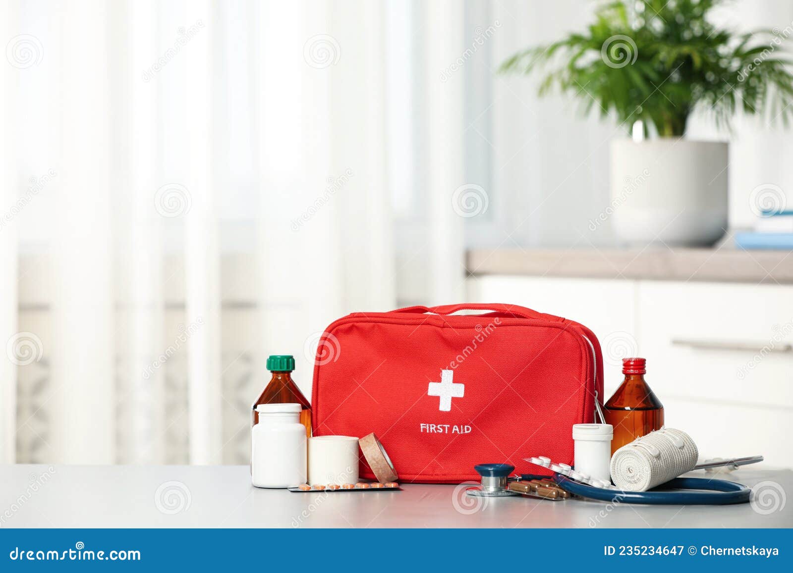 First Aid Kit on Table Indoors, Space for Text Stock Image - Image of ...