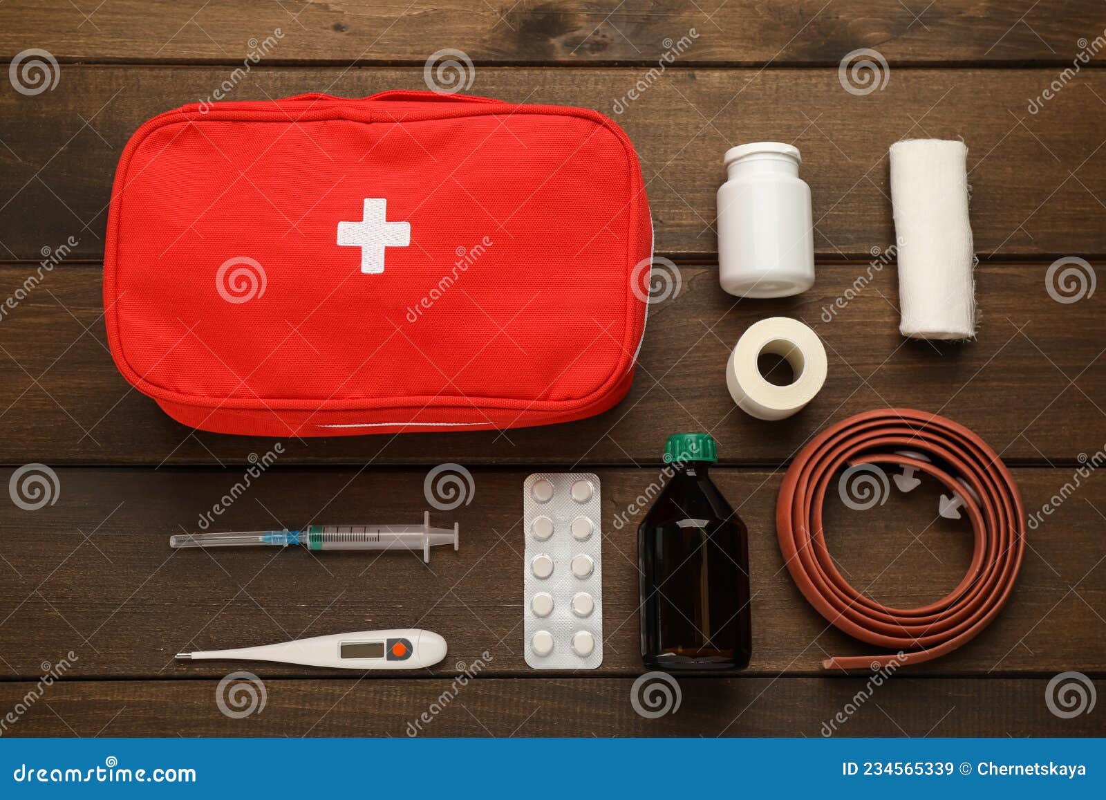 First Aid Kit on Wooden Table, Flat Lay Stock Image - Image of clinical ...
