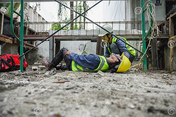First Aid Support Accident at Work of Builder Worker in Construction ...