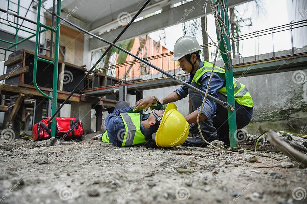 First Aid Support Accident at Work of Builder Worker in Construction ...