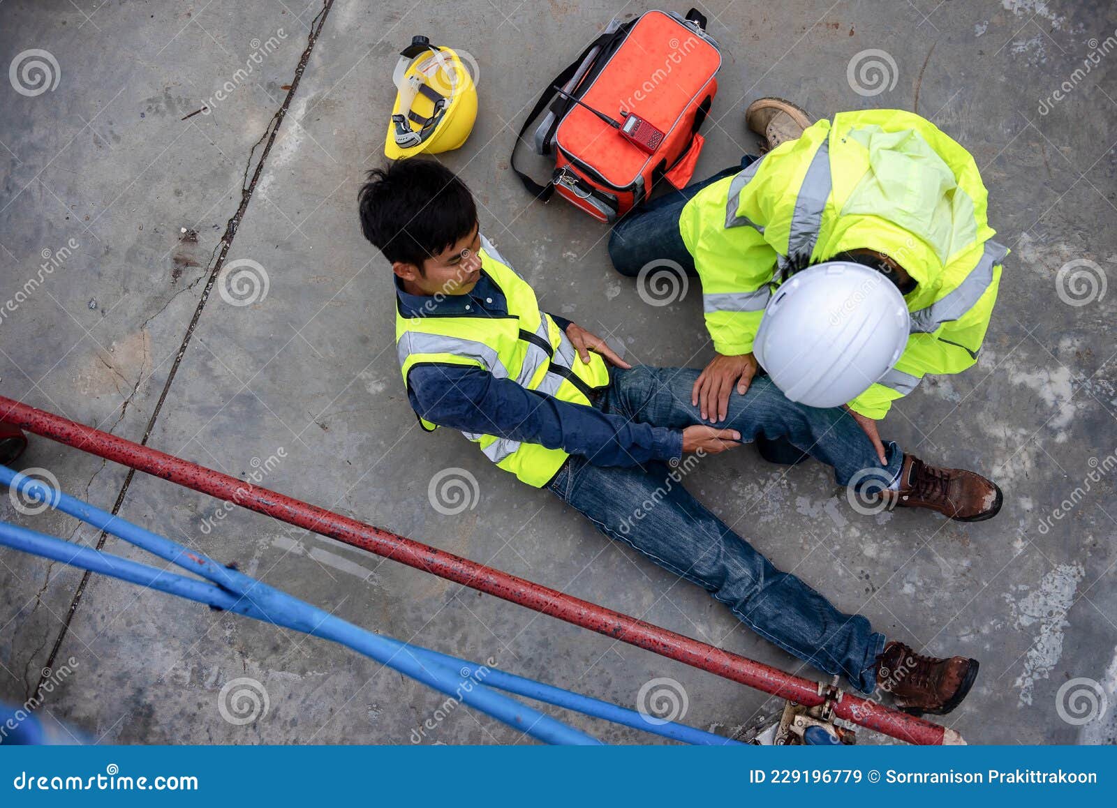 Accident in Industrial Work with First Aid Stock Image - Image of ...