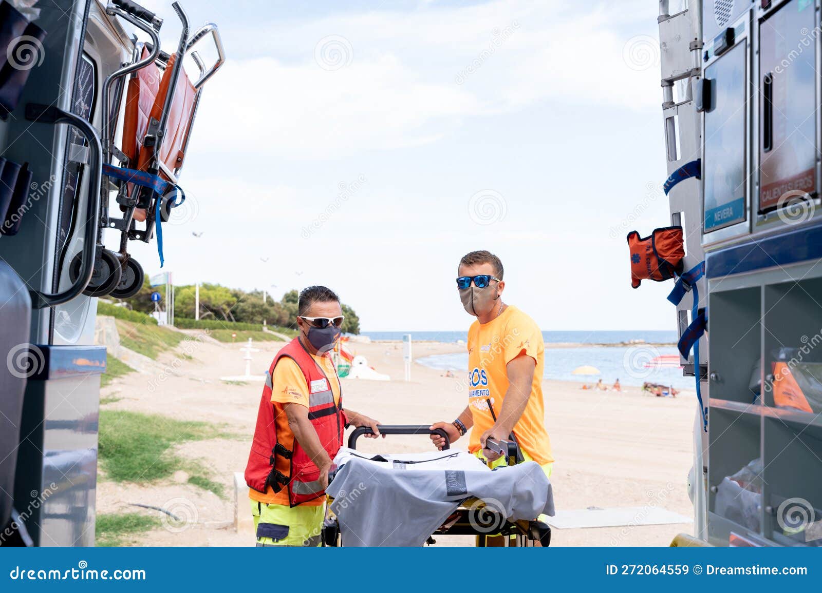First Aid Team Working on the Beach Stock Image - Image of medicine ...