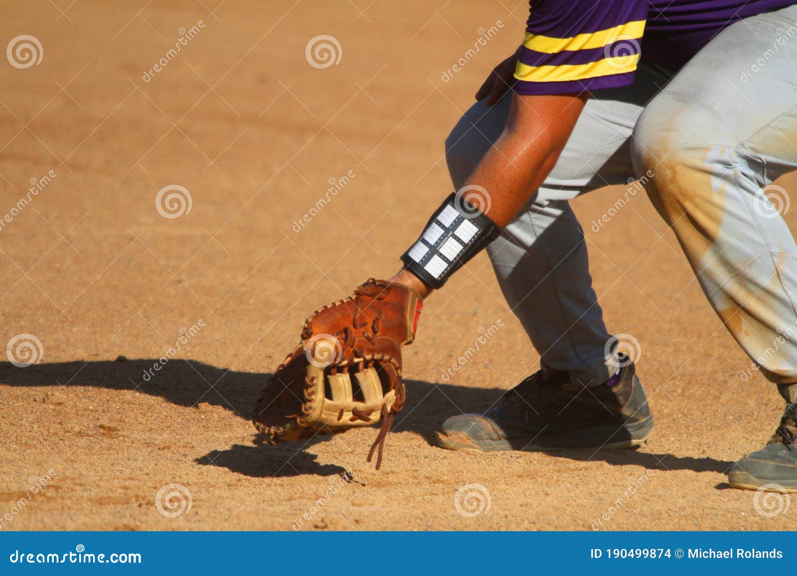 First Baseman Ready for Action Stock Photo - Image of glove, crouching ...