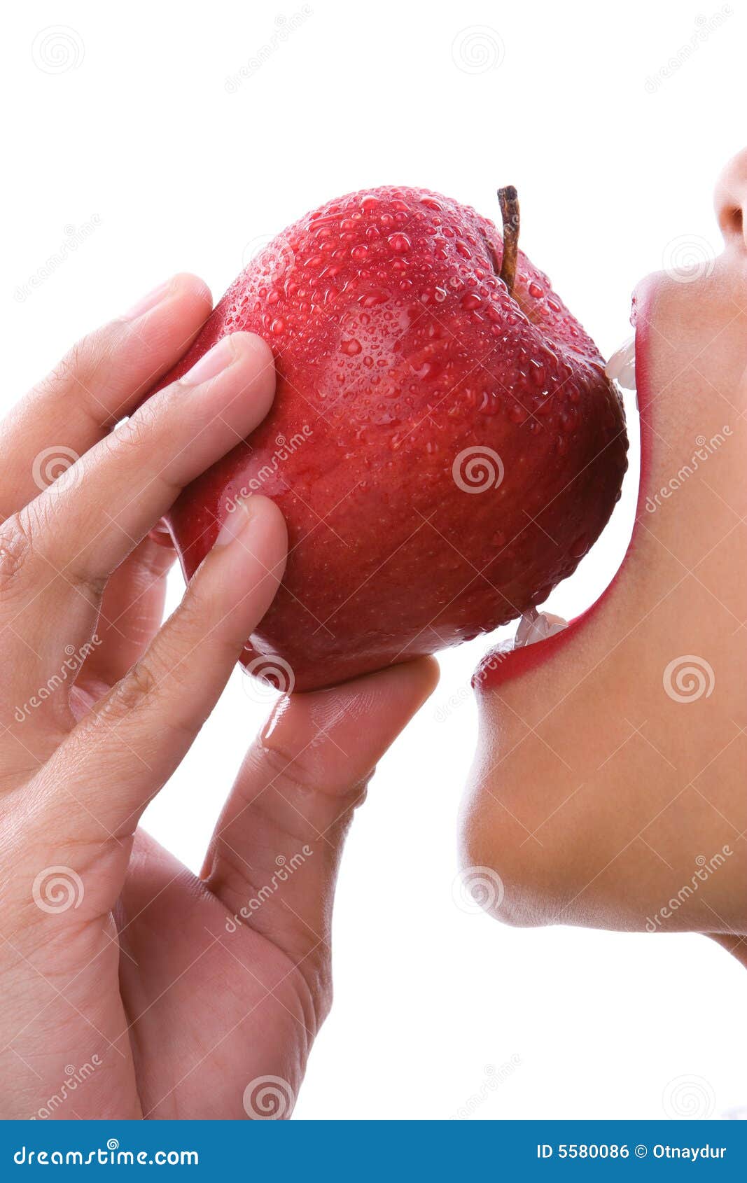 First bite of red apple stock photo. Image of white, fresh - 5580086