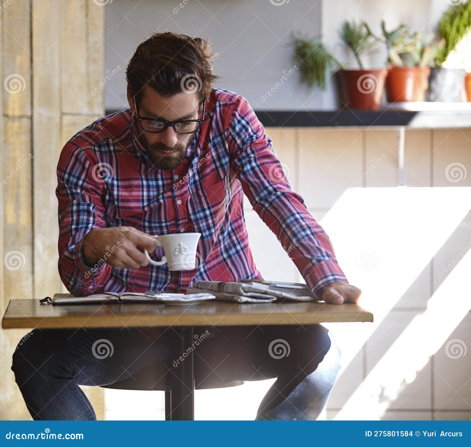 But First, Coffee. a Young Man Having Coffee at a Cafe. Stock Photo ...