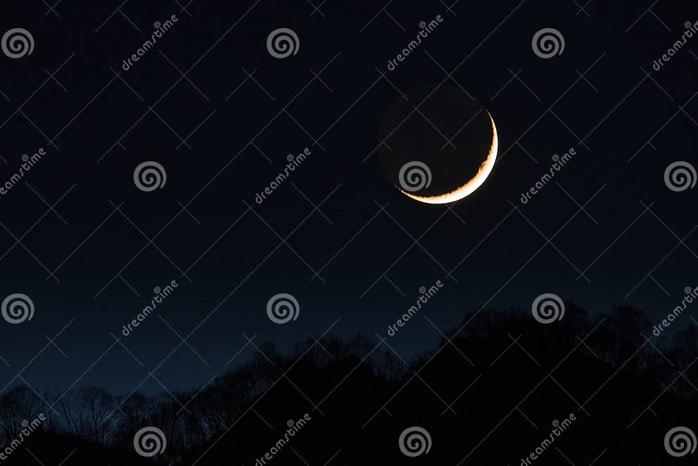 First crescent moon stock photo. Image of waning, night - 64985042