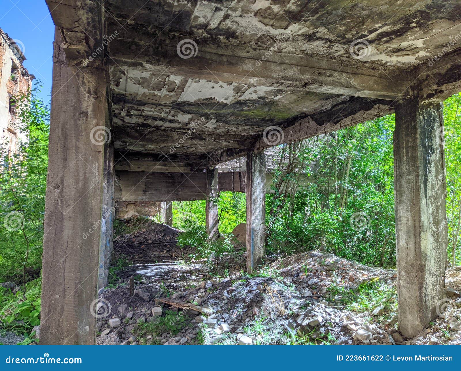 First Floor of a Destroyed Building that Stands on Columns. Stock Photo ...