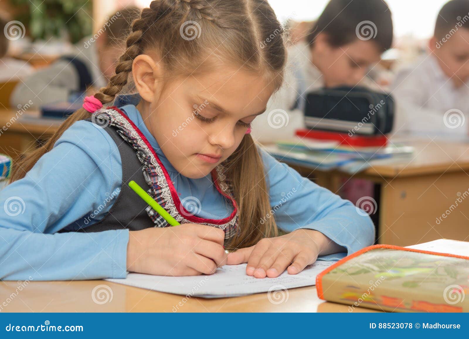 First Grader in Class Writing Notebook Stock Photo - Image of math ...
