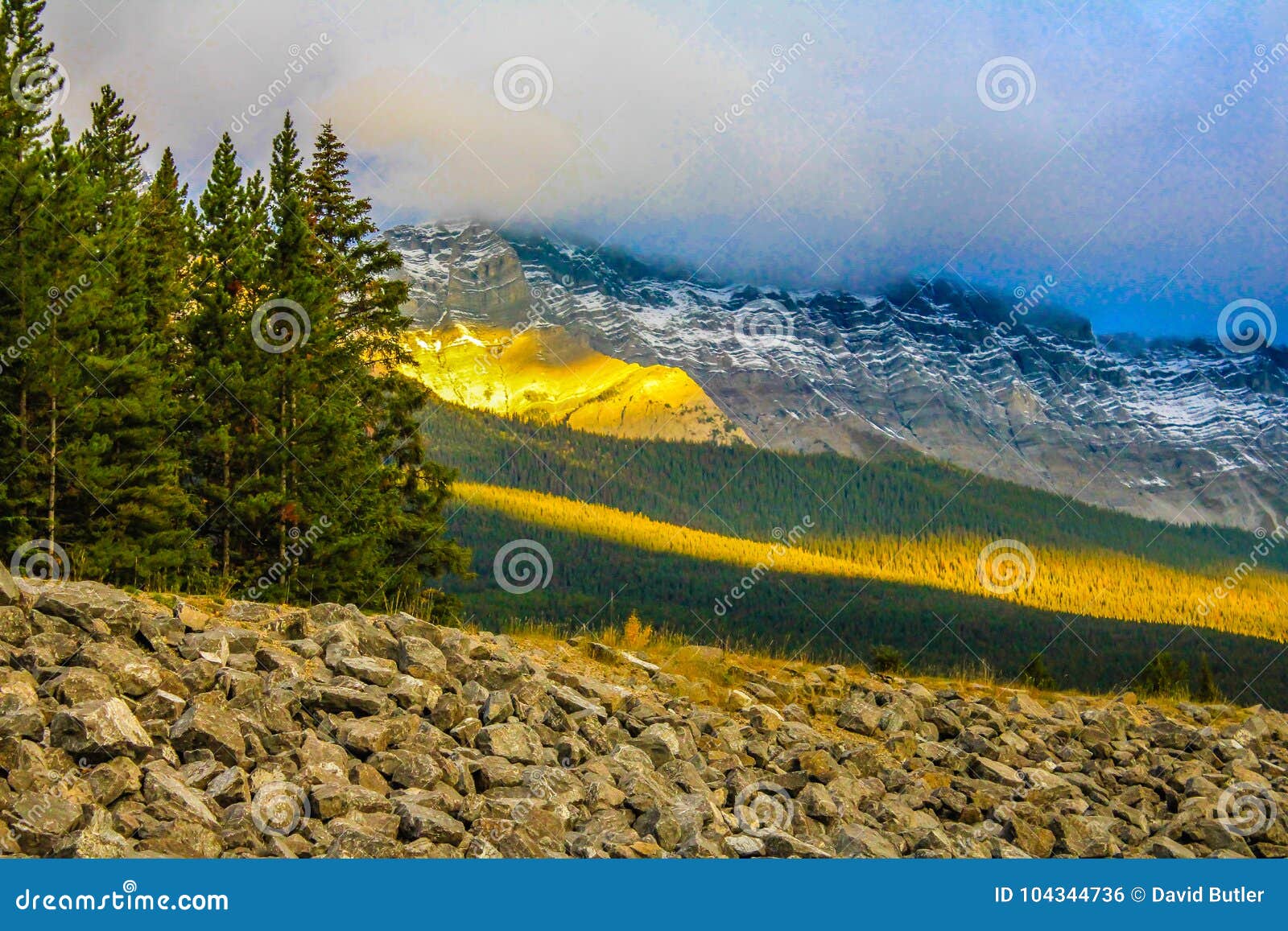 First Light through the Clouds Stock Photo - Image of rivers, alberta ...