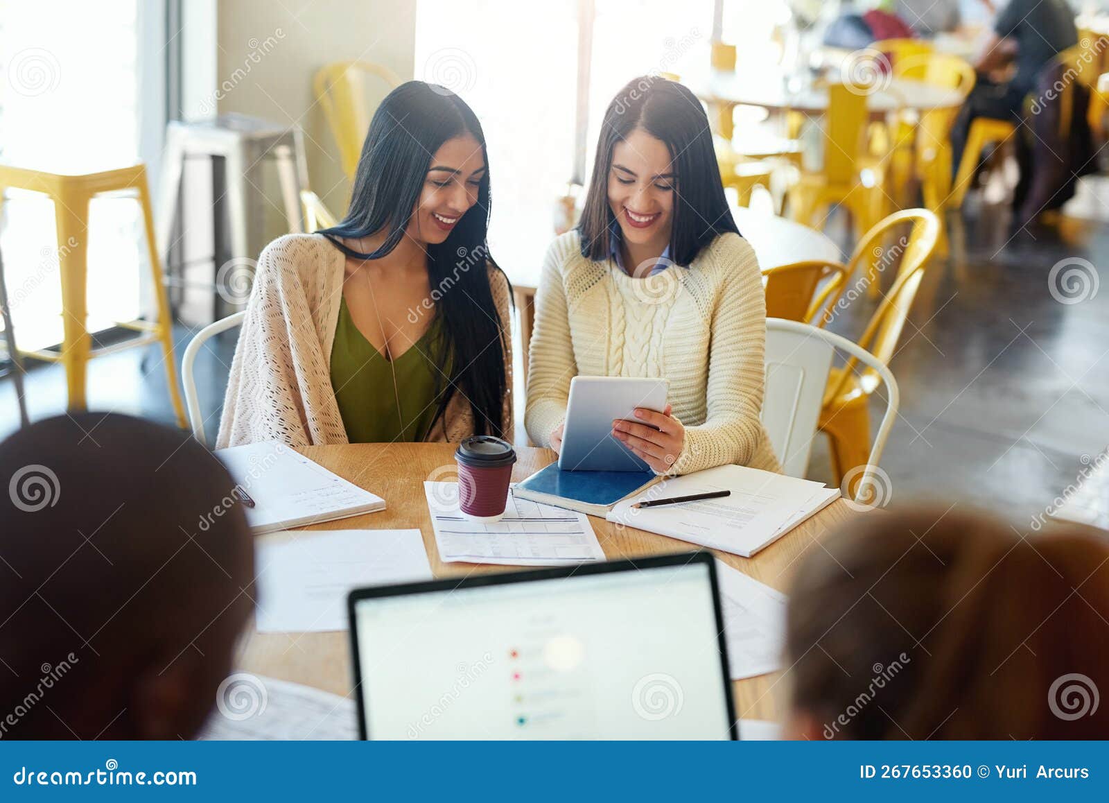 But First, Memes. a Group of Young Friends Having a Study Session in a ...