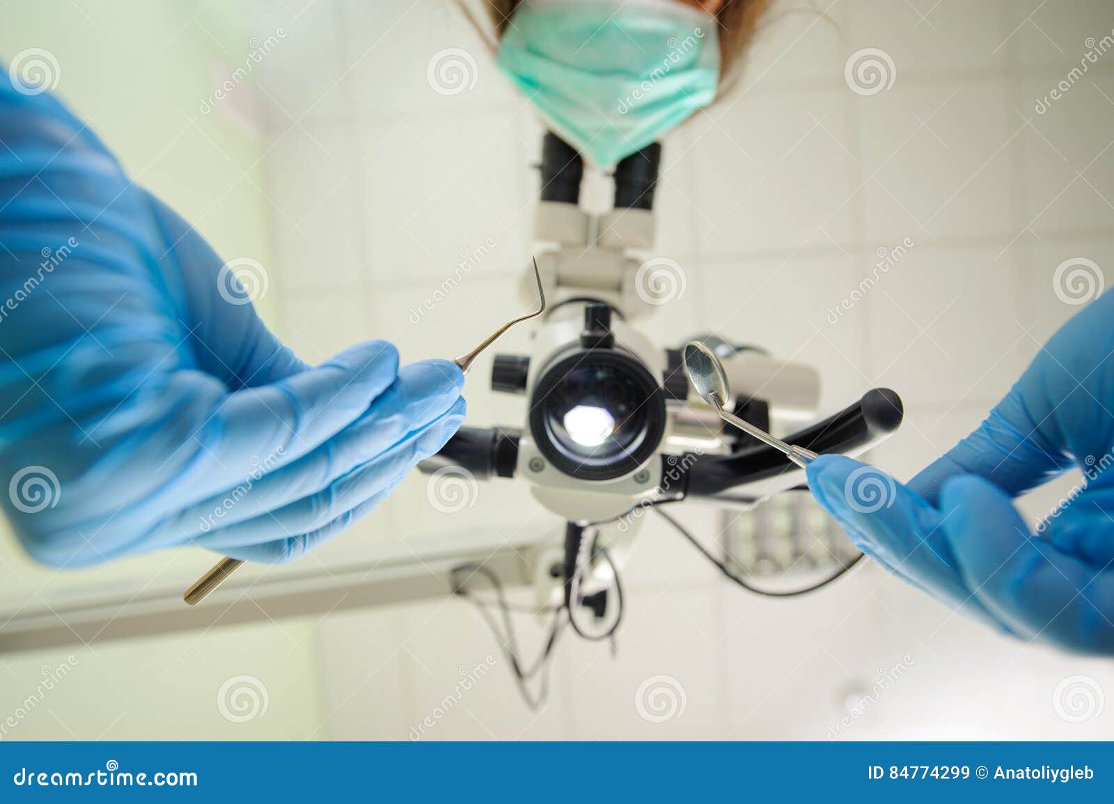 First Person View on Female Dentist Using Microscope Stock Image ...