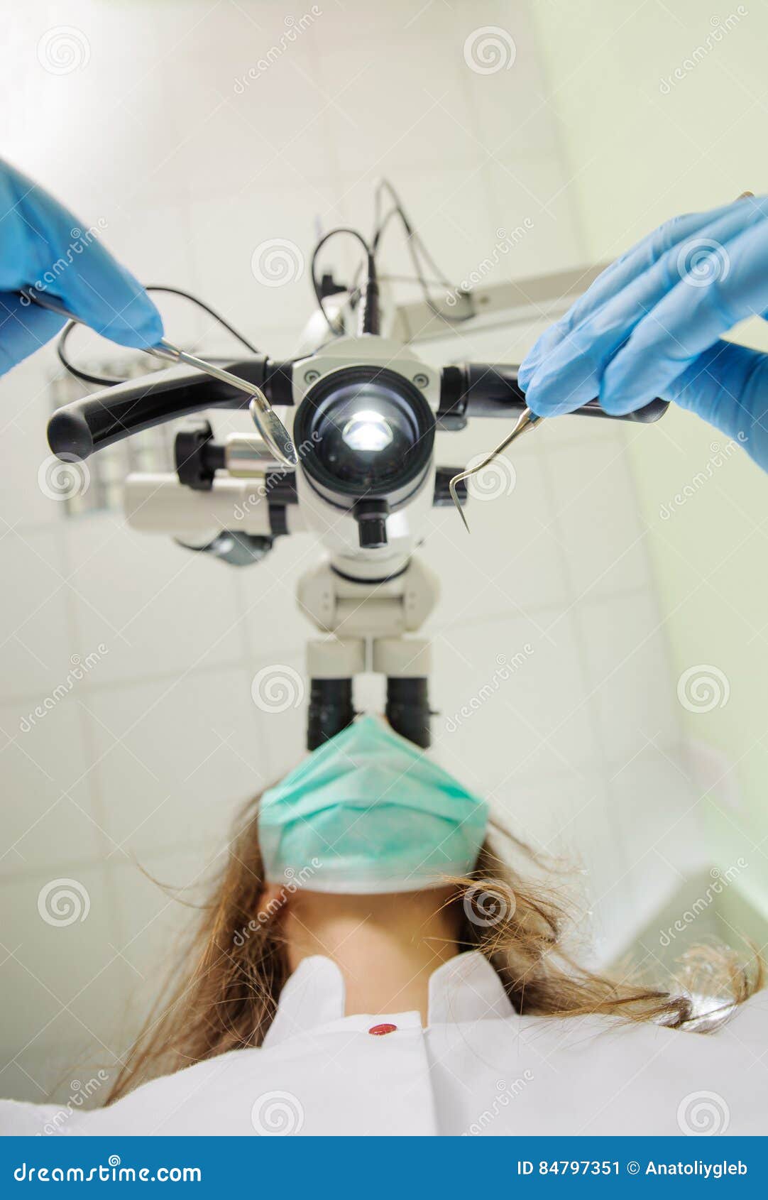 First Person View on Female Dentist Using Microscope Stock Image ...