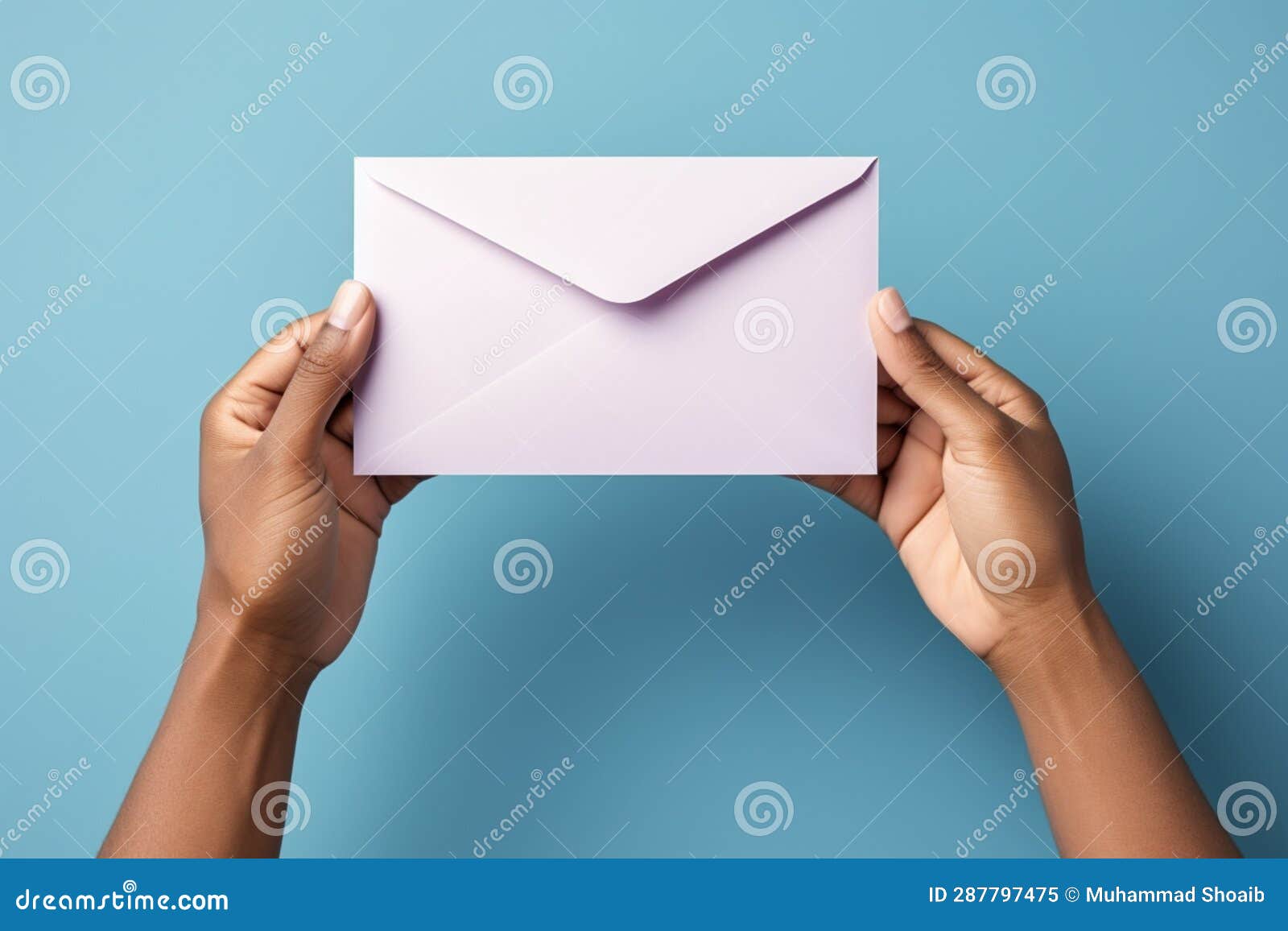 First-person View: Hands Grasp Blue Envelope, White Card on Pastel ...