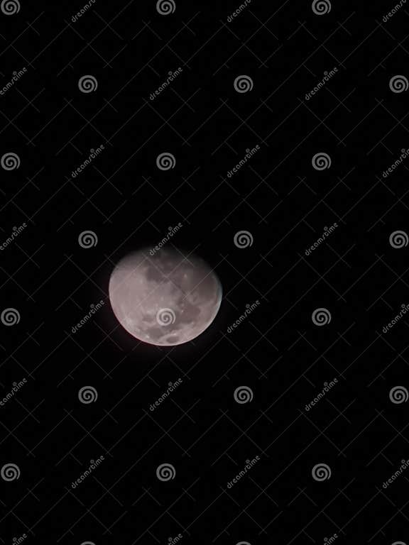 First quater moon in april stock image. Image of moon - 181665507