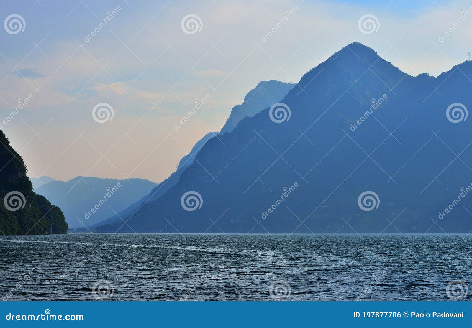 Shades on the lake stock photo. Image of mountain, mountains - 197877706