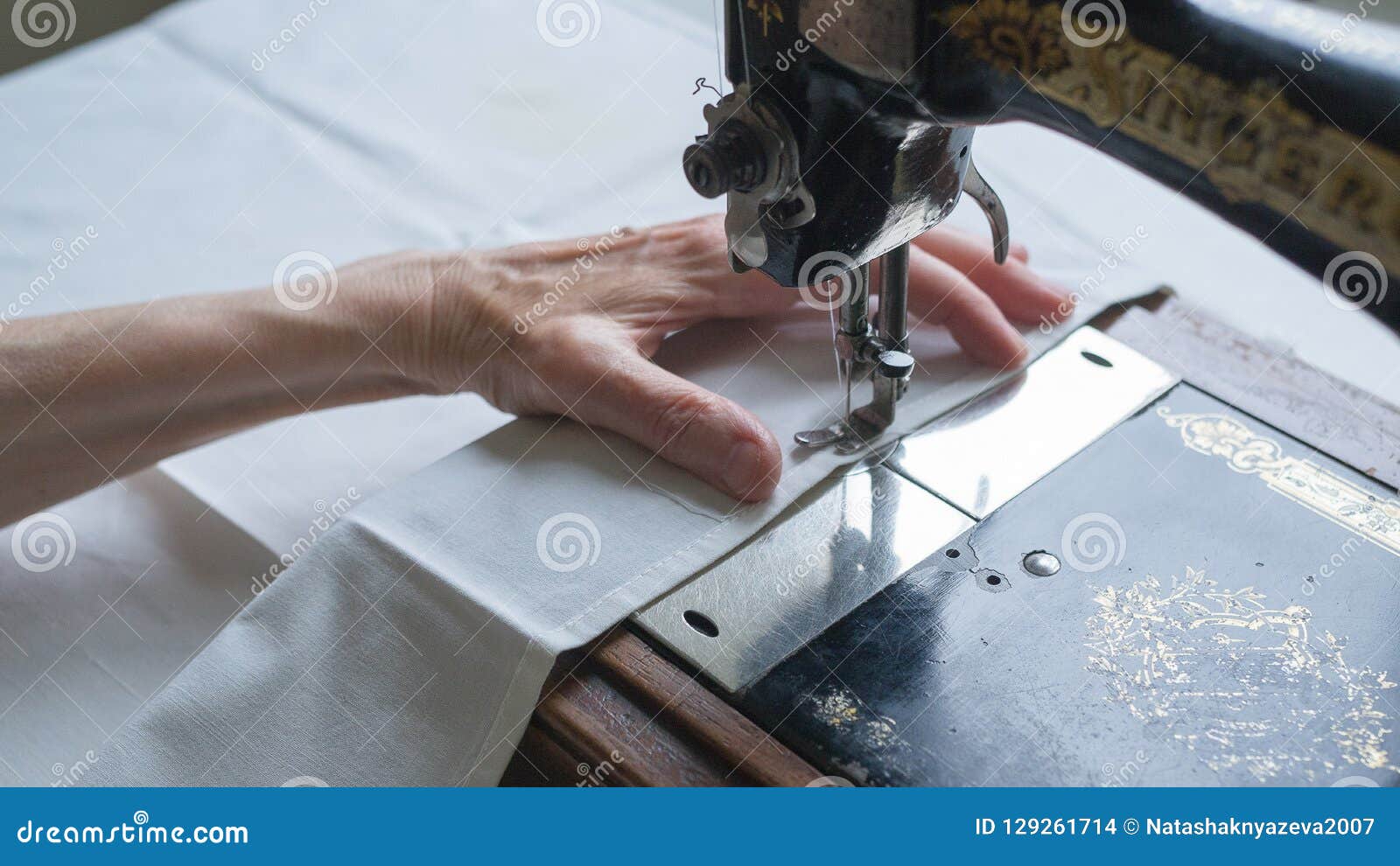 First SINGER Sewing Machine. Sewing Process. Foot of Old Vintage Sewing ...