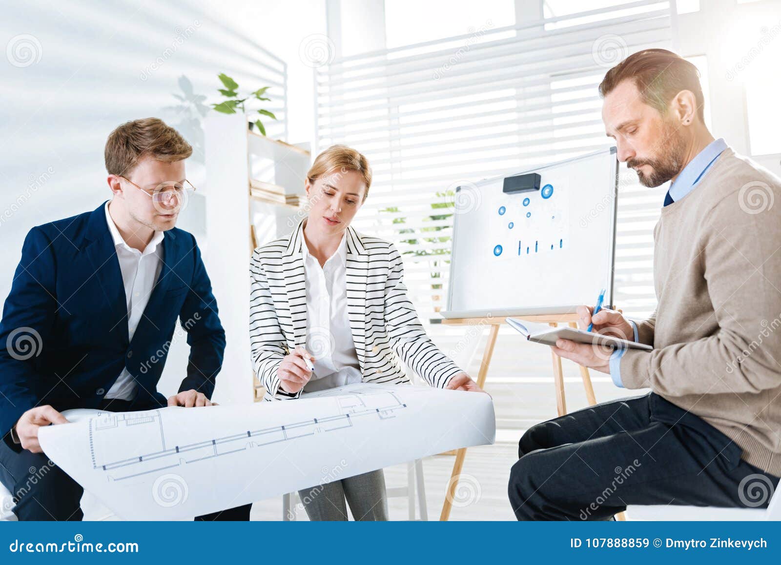 Thoughtful Three Colleagues Drawing Plan Stock Image - Image of ...