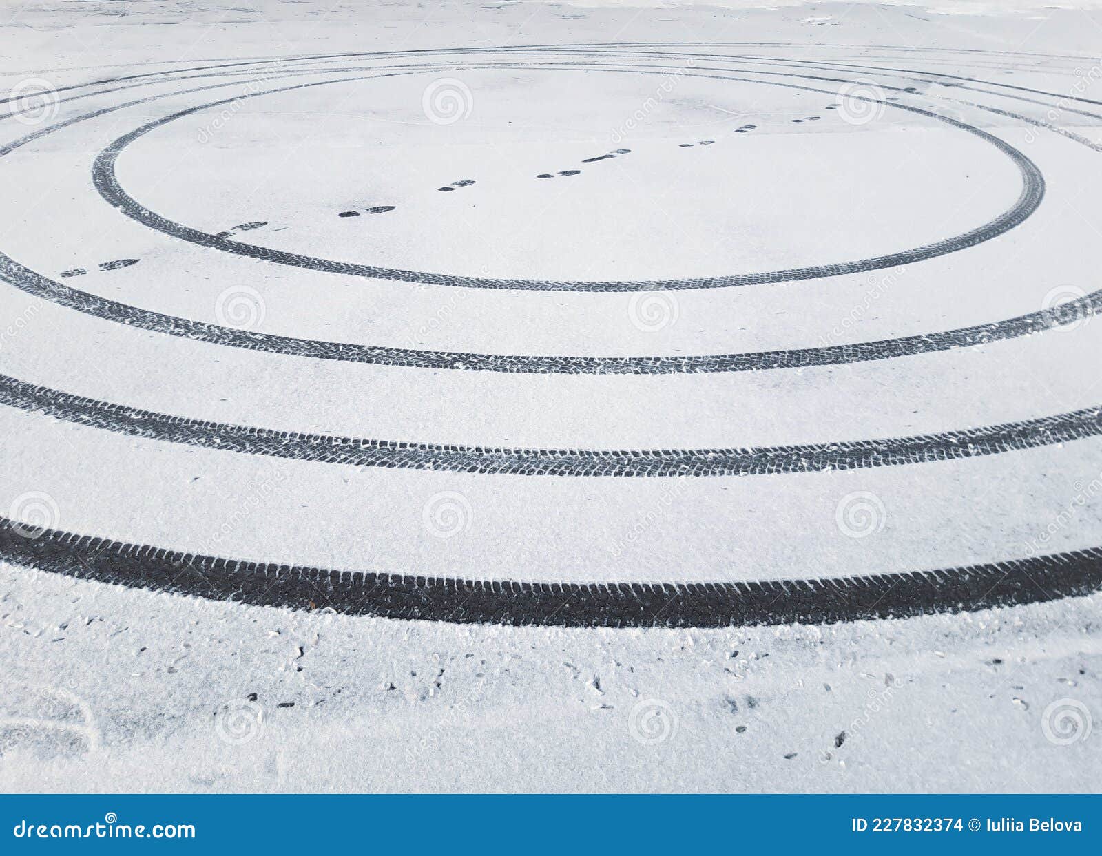 First Snow. an Imprint of the Wheels of a Car in a Circle and a Man ...