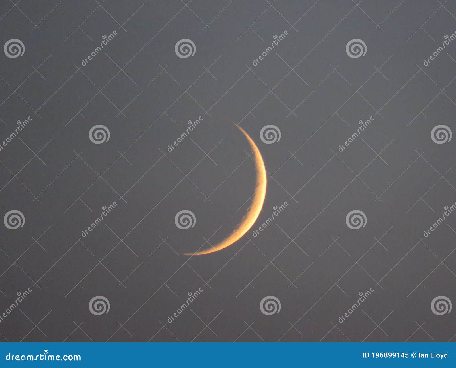 First Stage of the Crescent Moon Orange with the Setting Sun Stock ...