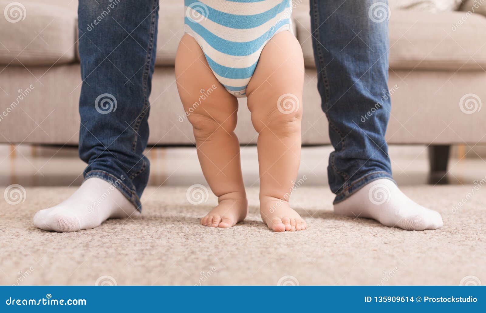 Baby Boy Learning To Walk with Help of Father Stock Photo - Image of ...
