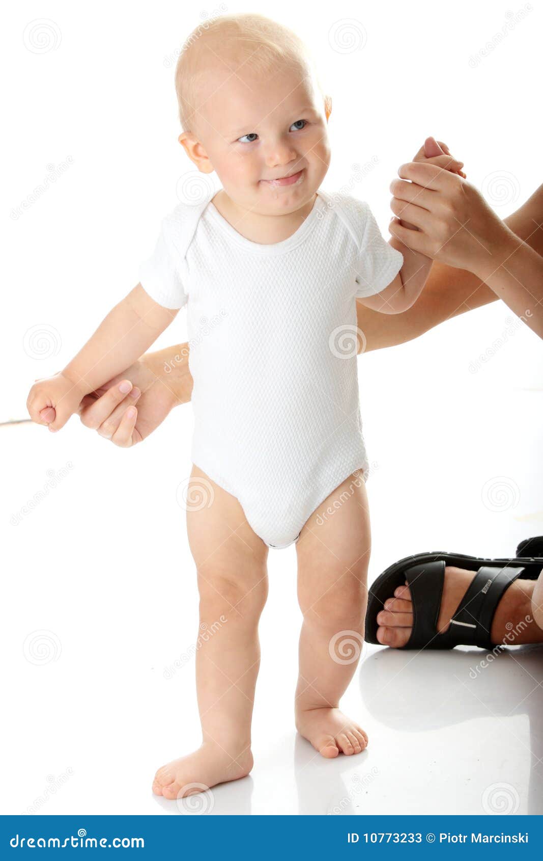 First steps of small baby stock image. Image of family - 10773233