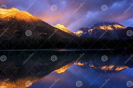 First Sunlight on Mountain Tops Stock Photo - Image of reflect, bright ...