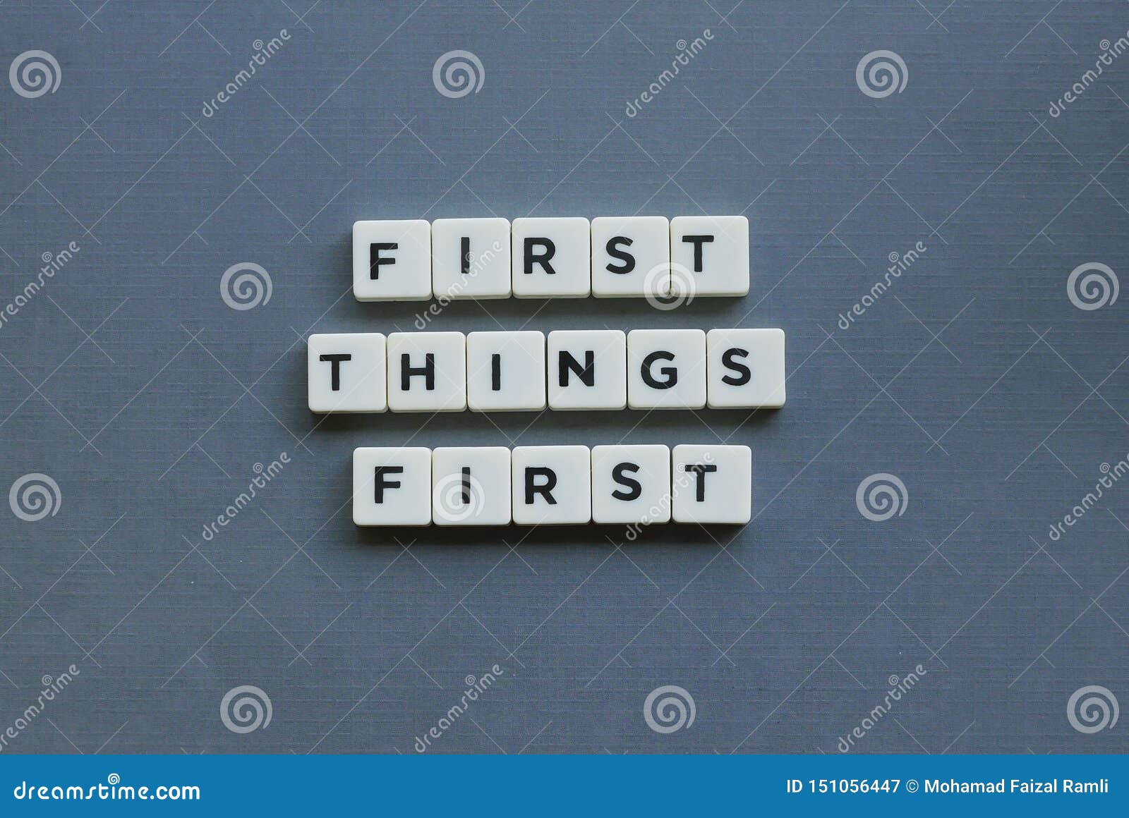 First Things First Word Made of Square Letter Word on Grey Background ...
