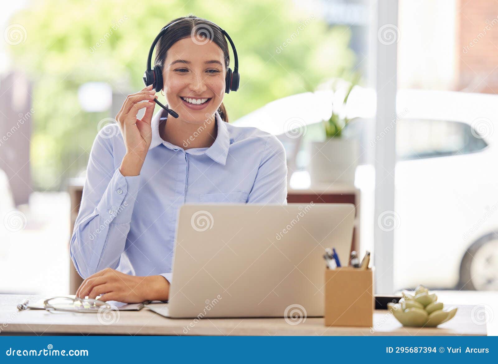 Always the First To Answer Your Calls. a Young Call Centre Agent ...