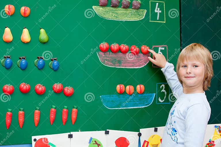 First year schoolgirl stock image. Image of pupil, board - 27591689