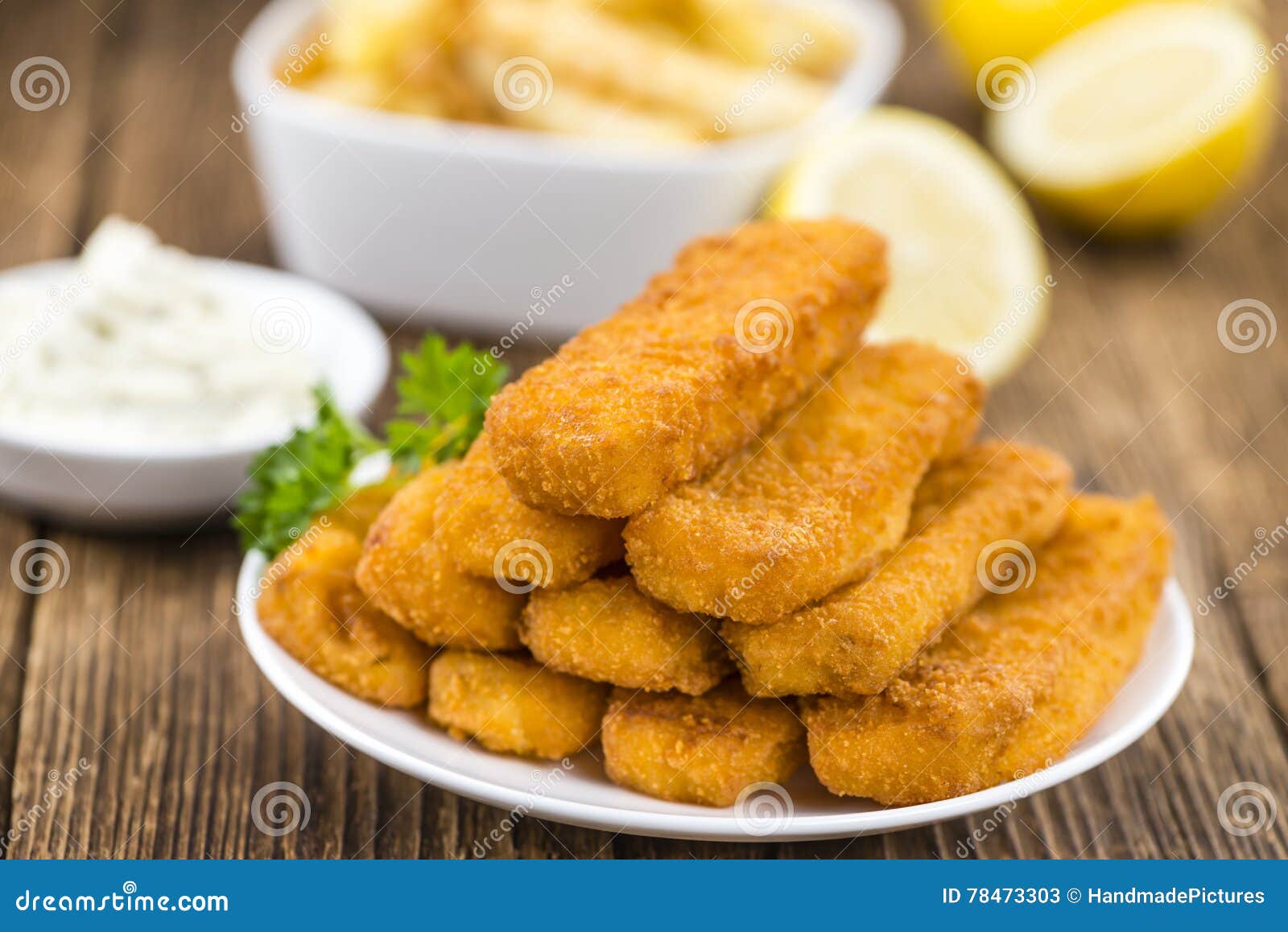 Fisch Sticks (close-up Shot) on an Old Wooden Table Stock Image - Image ...