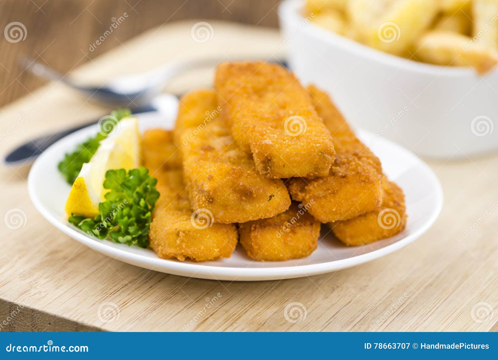 Fisch Sticks (close-up Shot) on an Old Wooden Table Stock Image - Image ...