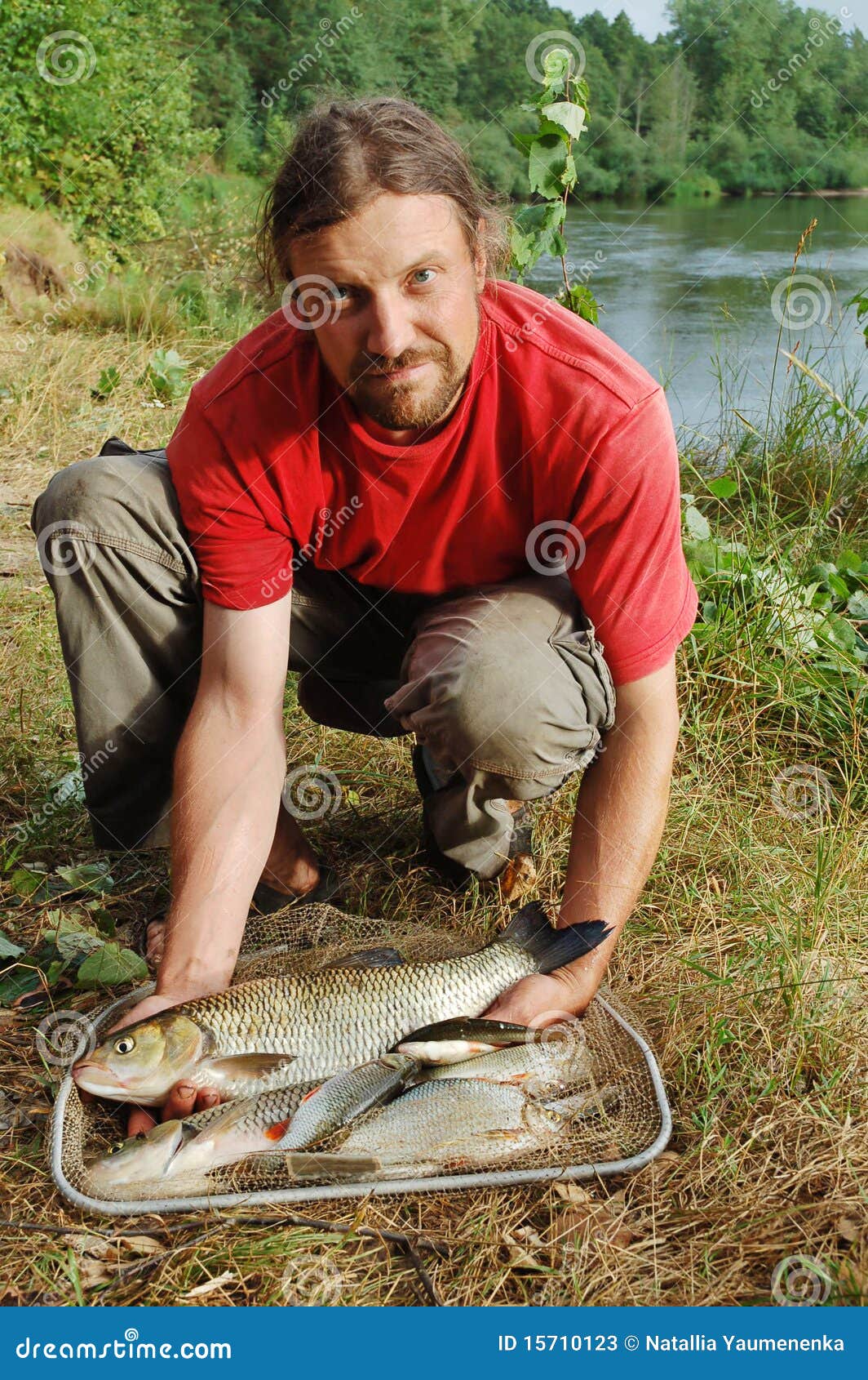 Fischer und ein Fisch stockbild. Bild von gestänge, kleidung - 15710123