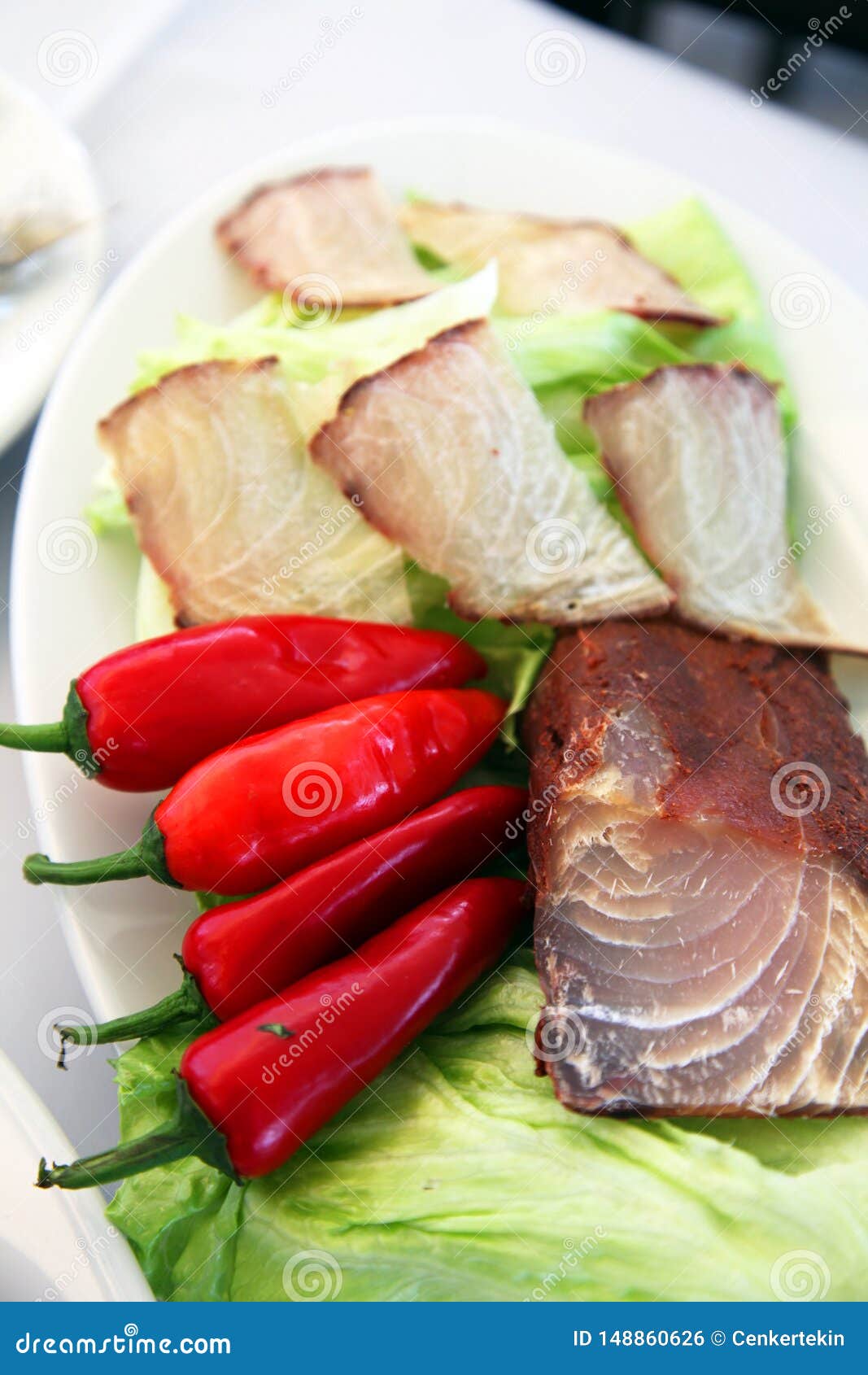 Fish bacon with red pepper stock photo. Image of garnish - 148860626