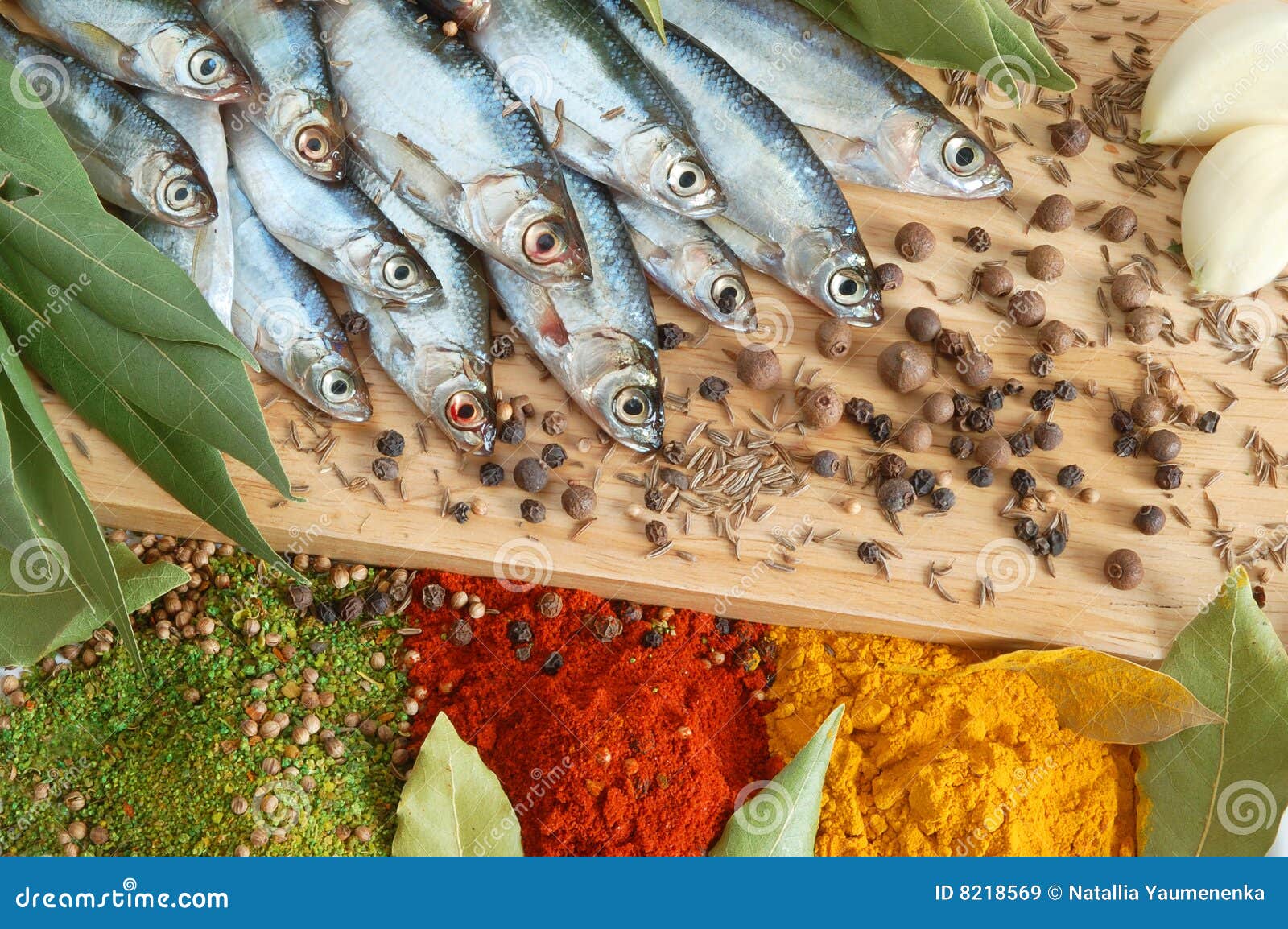 Fish with Bay Leaves and Spice Stock Image - Image of colored, chilli ...