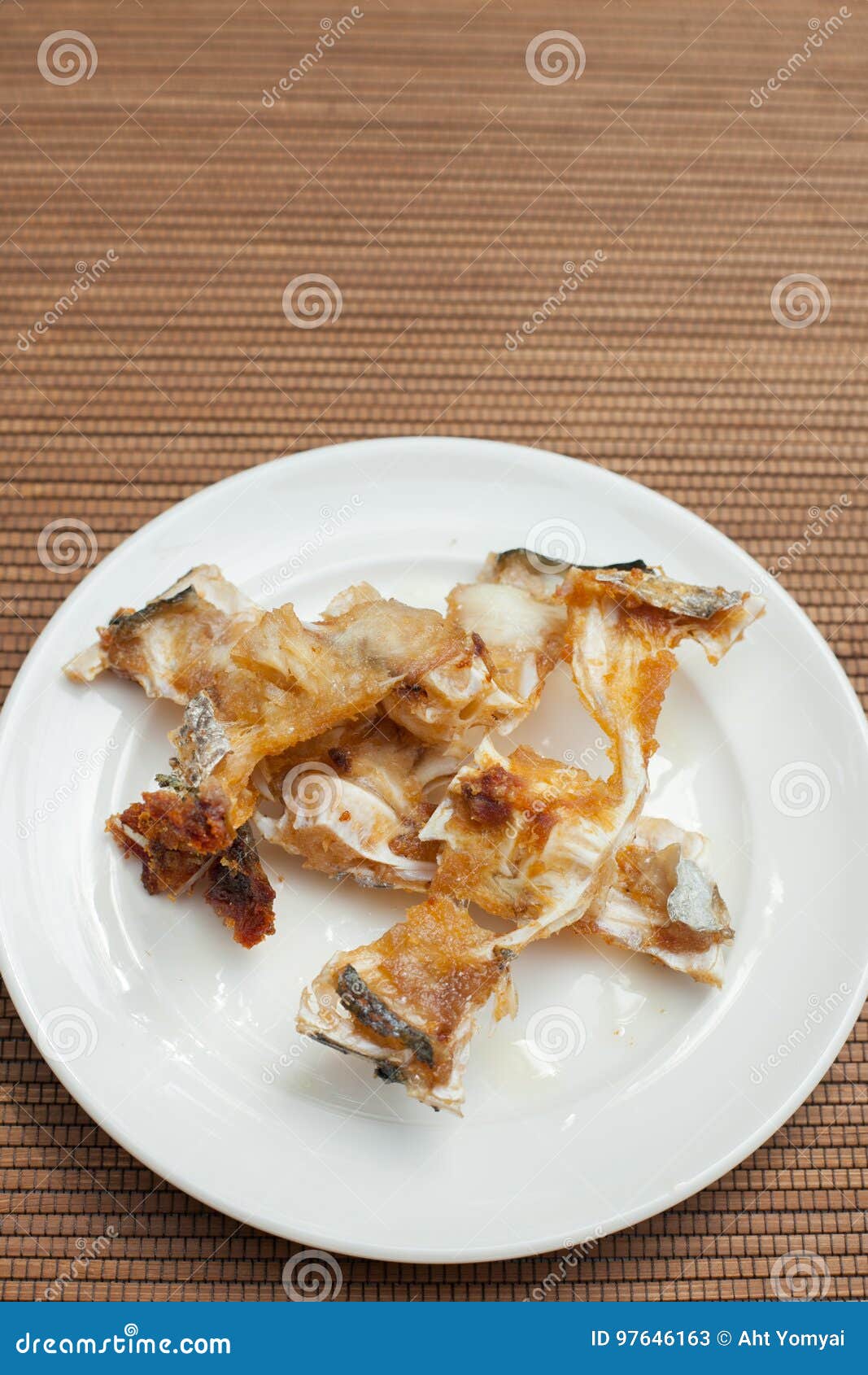 Fish bones on a plate stock image. Image of fork, background - 97646163